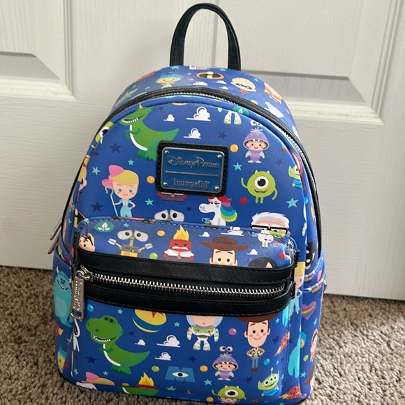 Loungefly | Bags | Disney Pixar Chubi Loungefly Backpack New With Tags ...